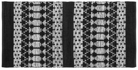 Kožený koberec 80 x 150 cm černý/béžový SOKUN Beliani