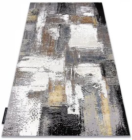 Moderní koberec DE LUXE 633 Abstrakce Strukturální krém / zlato velikost 240x340 cm | krásné koberce cz