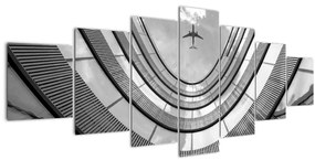 Obraz - Letadlo nad budovou (210x100 cm)