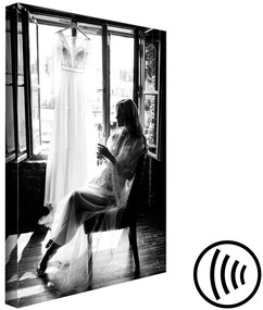 Obraz Žena a svatební šaty - černobílá fotografie s sedící ženou