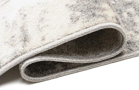 Krémový designový koberec s šedým abstraktním vzorem Šířka: 120 cm | Délka: 170 cm