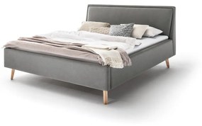 Světle šedá čalouněná dvoulůžková postel s úložným prostorem s roštem 160x200 cm Frieda – Meise Möbel
