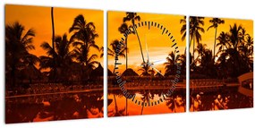 Obraz - Západ slunce nad resortem (s hodinami) (90x30 cm)