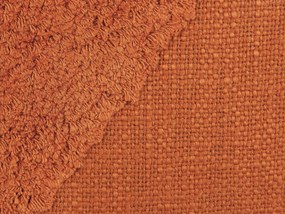 Tkaný bavlněný polštář s geometrickým vzorem a střapci 45 x 45 cm oranžový AVIUM Beliani