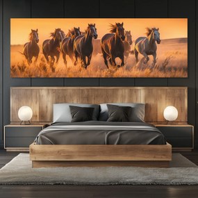 Obraz na plátně - Stádo divokých koní, zlatý západ slunce FeelHappy.cz Velikost obrazu: 180 x 60 cm