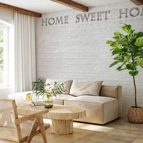 Fototapeta Home sweet home - béžový nápis se stínem a odrazem na bílé cihle