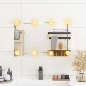 Nástěnné zrcadlo s LED osvětlením 40 x 60 cm sklo obdélníkové 3189152