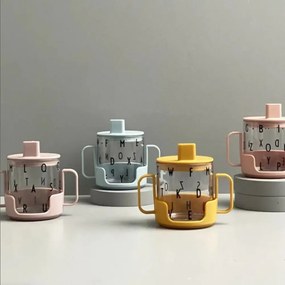 Zelený dětský hrnek Design Letters Grow With Your Cup