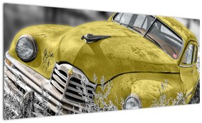 Obraz žlutého auta na louce (100x40cm)