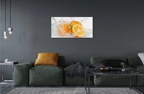 Obraz na skle Pomeranče ve vodě 100x50 cm