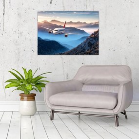 Skleněný obraz - Letadlo nad vrchoky hor (70x50 cm)