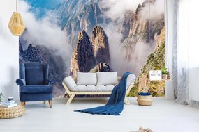 DIMEX | Samolepicí vliesová fototapeta na zeď Mlhavé vrcholky hor MA-5-1691 | 375 x 250 cm | modrá, hnědá, šedá