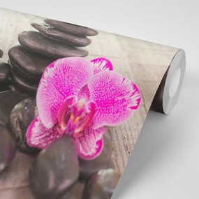 Samolepící fototapeta orchidej a Zen kameny na dřevě