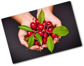 Wallmuralia Kuchyňská deska velká skleněná Višně v dlaních 80x52 cm
