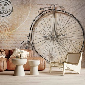 Fototapeta Starý bicykl - starý jízdní kolo v retro stylu s velkým kolem v sépii