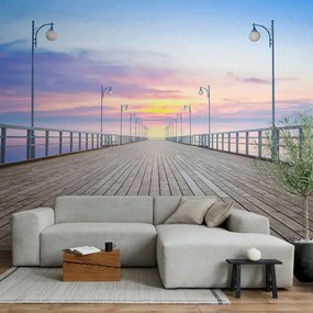 Fototapeta Západ slunce na molu - krajina s klidným mořem a bílým mostem