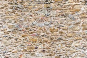 DIMEX | Vliesová fototapeta Béžová kamenná zeď MS-5-2388 | 375 x 250 cm| béžová, žlutá, oranžová, hnědá