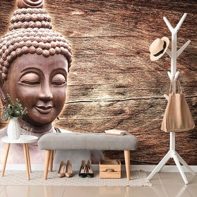 Samolepící tapeta socha Buddhy na dřevěném pozadí - 150x100 cm