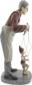 Dekorace muž s loutkou Pinocchio - 16*14*36 cm