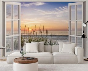 Gario Fototapeta Okno - západ slunce na pláži Materiál: Vliesová, Rozměry: 140 x 100 cm