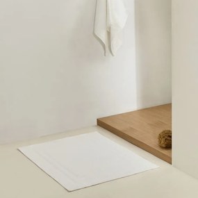 OnaDnes -20% Bílá bavlněná koupelnová předložka Kave Home Yanay 50 x 70 cm