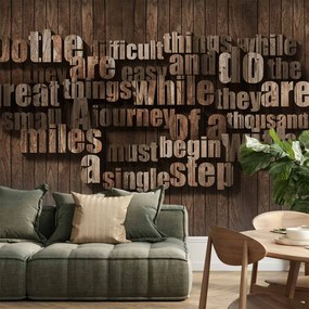 Fototapeta Motivační citát - nápis v angličtině na pozadí s dřevěnou texturou