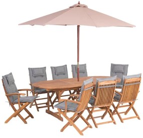 Zahradní stůl a 8 židlí s šedými polštáři a deštníkem MAUI Beliani