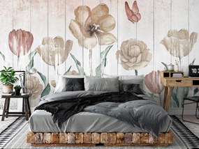 Fototapeta Tulipány na louce - vybledlé květiny na dřevěném bílo-růžovém pozadí