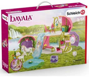 Schleich 42445 třpytivý květinový dům s jednorožci, jezerem a stájí