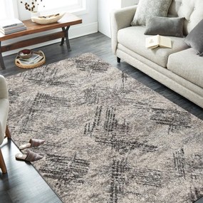 Originální vzorovaný koberec do obýváku béžové barvy Šířka: 120 cm | Délka: 170 cm