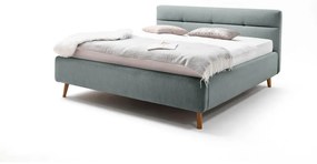 Modrá čalouněná dvoulůžková postel s úložným prostorem a s roštem 180x200 cm Lotte – Meise Möbel