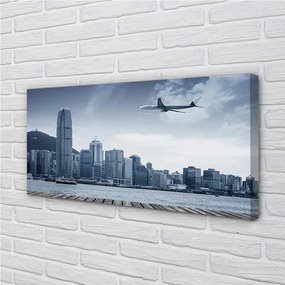 Obrazy na plátně Letadel mraky město 100x50 cm