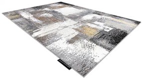 Moderní koberec DE LUXE 633 Abstrakce Strukturální krém / zlato velikost 140x190 cm | krásné koberce cz