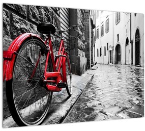 Skleněný obraz červeného kola na dlážděné ulici (70x50 cm)