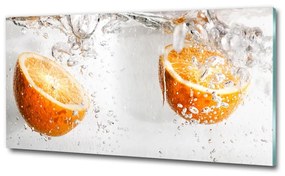 Wallmuralia Foto obraz skleněný horizontální Pomeranče pod vodou 100x50