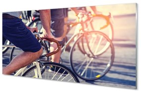 Obraz na skle cyklisté lidí 140x70 cm
