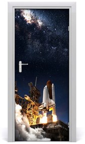 Fototapeta samolepící dveře startující raketa 75x205 cm