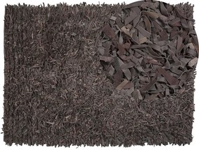 Hnědý shaggy kožený koberec 160x230 cm MUT Beliani