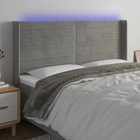Čelo postele s LED světle šedé 203 x 16 x 118/128 cm samet
