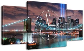Gario Obraz s hodinami Panorama Manhattanu - 3 dílný Rozměry: 80 x 40 cm
