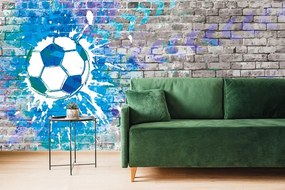 Tapeta modrý fotbalový míč na cihlové zdi - 150x100