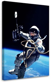 Gario Obraz na plátně Astronaut nad zemí - Nikita Abakumov Rozměry: 40 x 60 cm