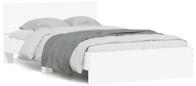 Rám postele s čelem a LED osvětlením bílý 135 x 190 cm