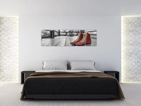 Obraz červených starých kolečkových bot (170x50 cm)