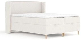 Krémová boxspring postel s úložným prostorem 160x200 cm Monpelli – Maison de Rêve