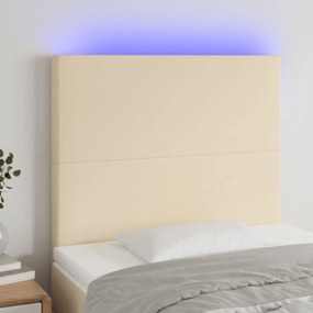 Čelo postele s LED krémové 100x5x118/128 cm textil