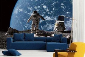 DIMEX | Samolepicí vliesová fototapeta na zeď Chůze astronauta MA-5-2240 | 375 x 250 cm | modrá, černá, šedá