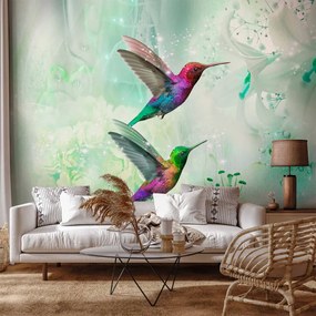 Fototapeta Barevní kolibři - motiv pestrobarevných ptáků v zelených vzorech