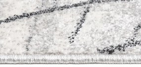 Světle krémový moderní koberec s motivem listů Šířka: 200 cm | Délka: 300 cm