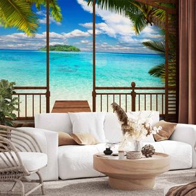 Fototapeta Pohled z okna - sluneční krajina s pláží a palmovými listy
